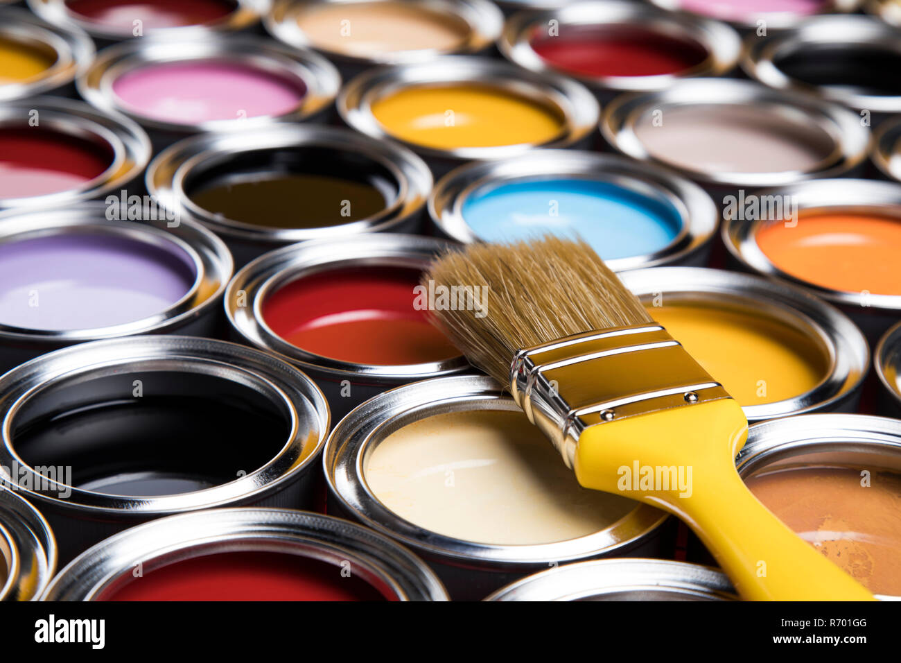 Paint brush, tin can and color guide samples Stock Photo - Alamy