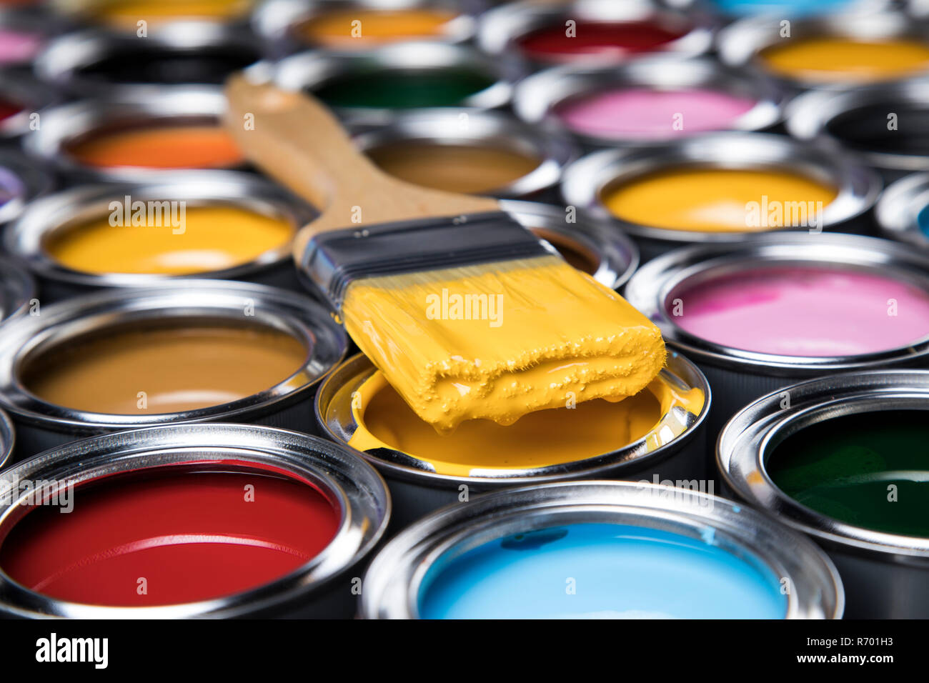 Open paint cans with a brush, Rainbow colors Stock Photo - Alamy