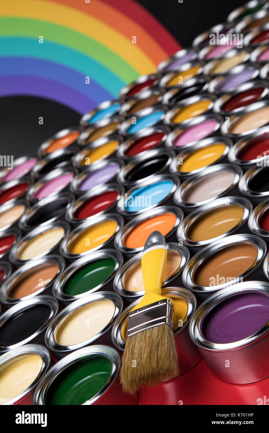 Rainbow colors, Open cans of paint Stock Photo - Alamy