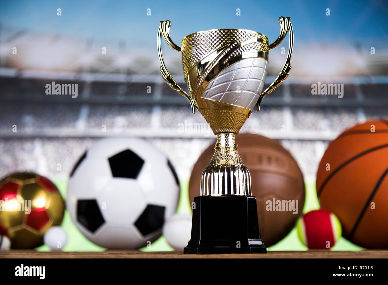 Winner trophy, Sport equipment and balls Stock Photo - Alamy
