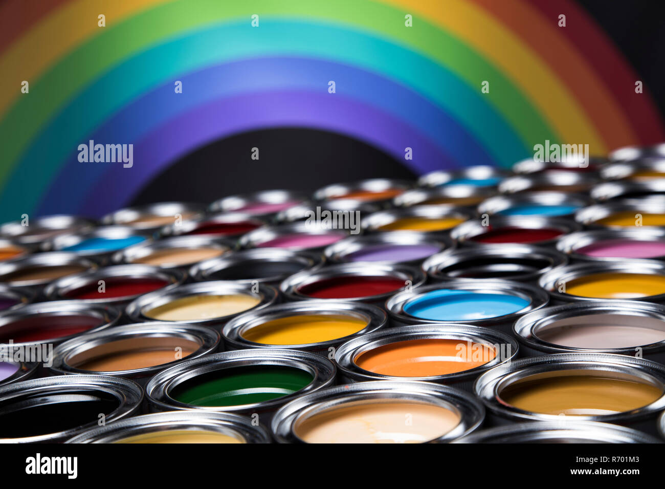 Rainbow colors, Open cans of paint Stock Photo - Alamy