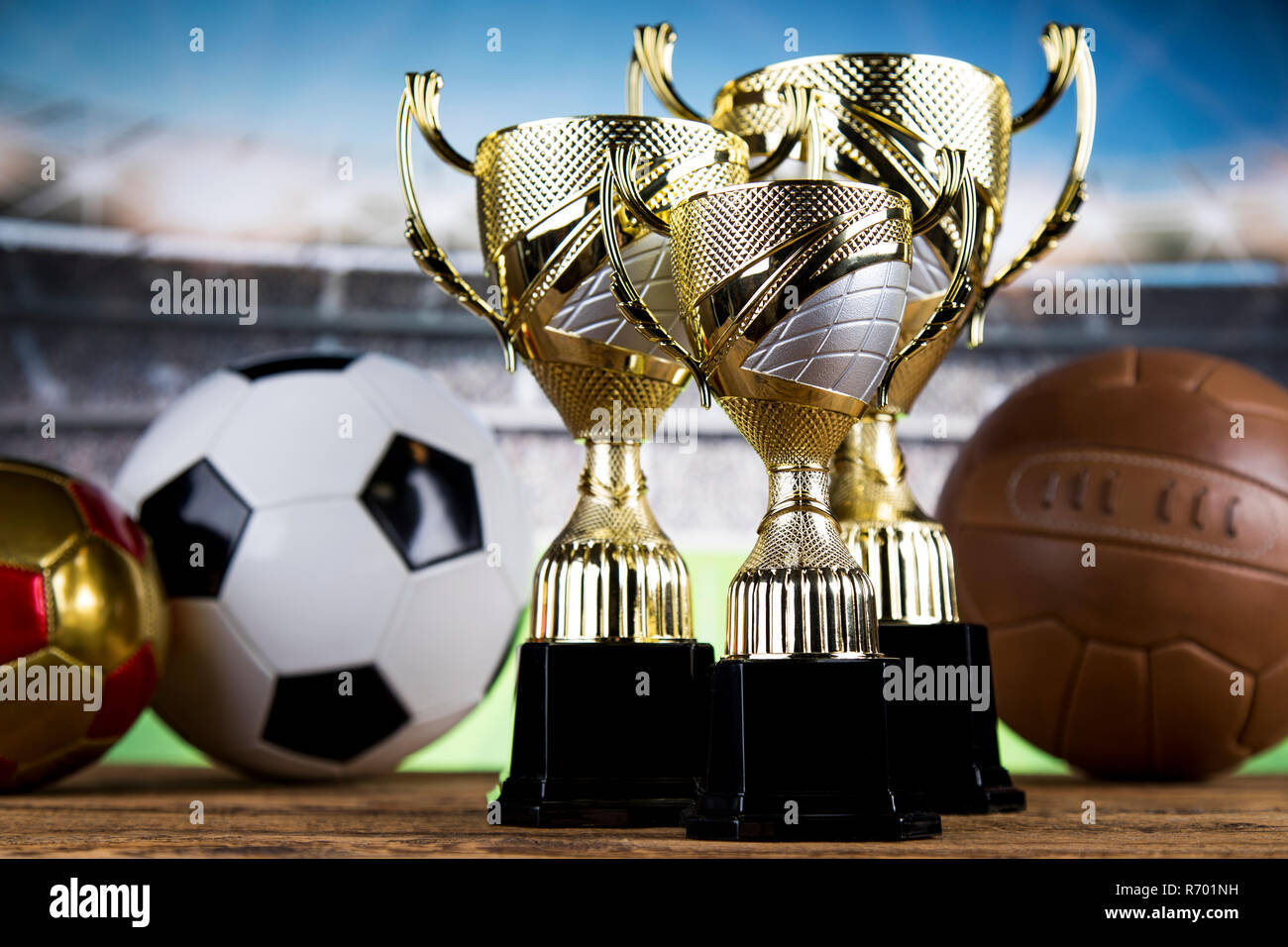 Winner trophy, Sport equipment and balls Stock Photo - Alamy