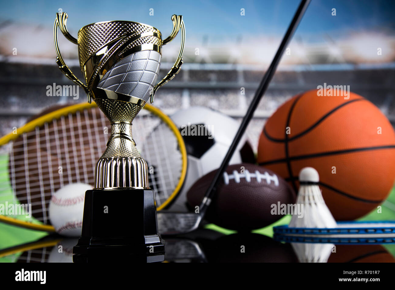 Winner trophy, Sport equipment and balls Stock Photo - Alamy