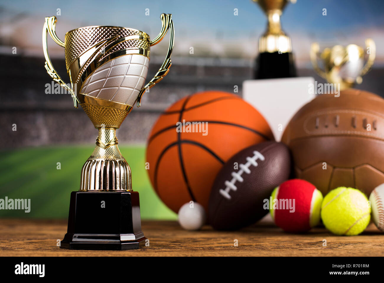 Winner trophy, Sport equipment and balls Stock Photo - Alamy
