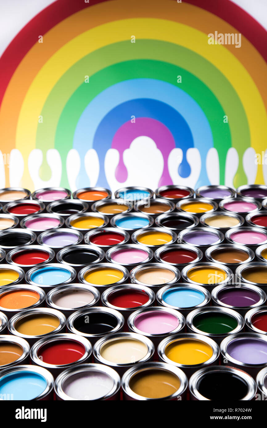 Rainbow colors, Open cans of paint Stock Photo - Alamy