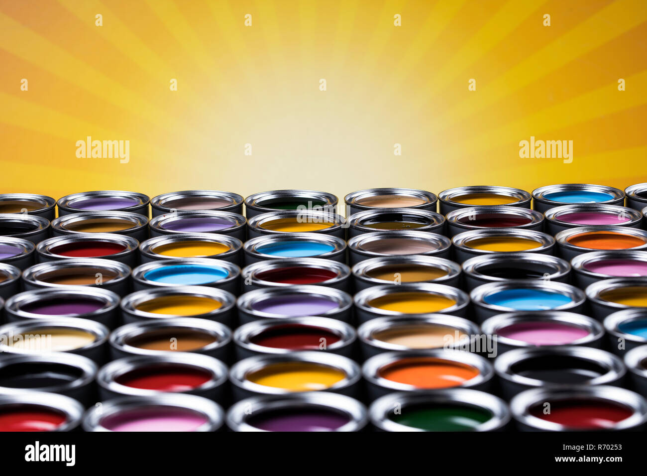 Collection of colored paints cans Stock Photo - Alamy