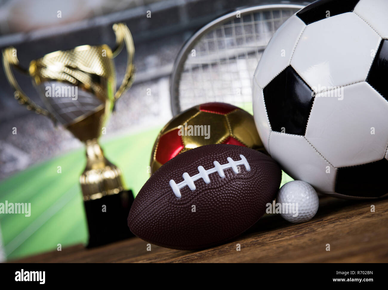 Winner trophy, Sport equipment and balls Stock Photo - Alamy