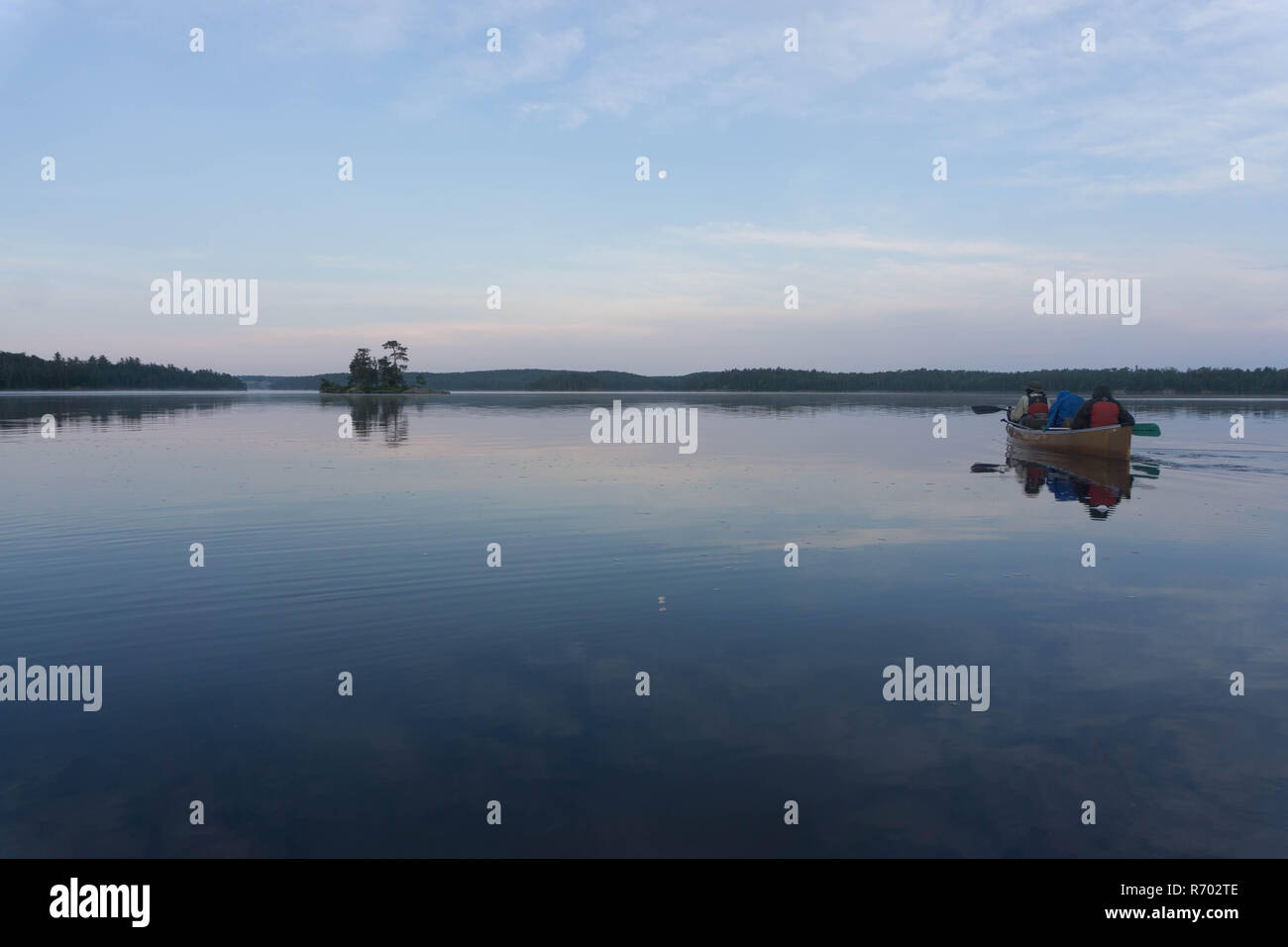 Canoeing on a calm lake in the Quetico Provincial Park Canada Stock ...
