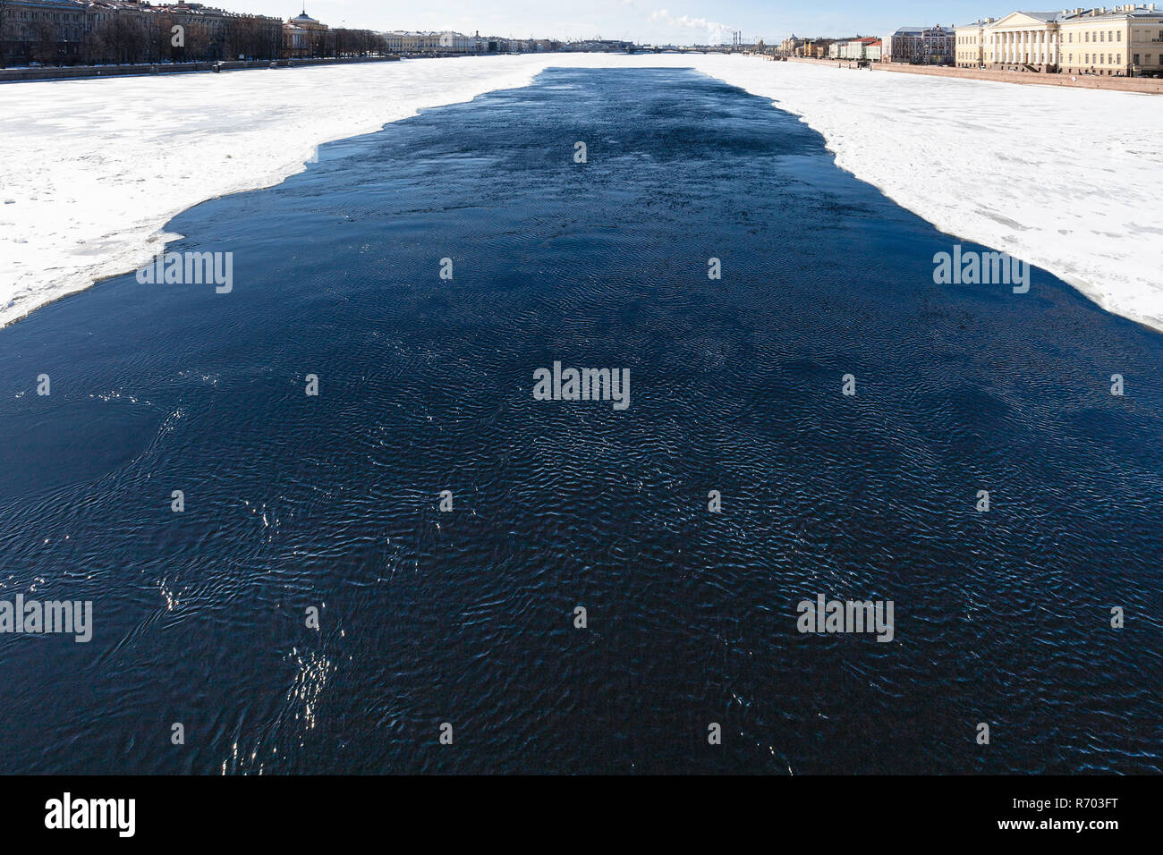 dark water in polynya in Neva river in spring Stock Photo - Alamy