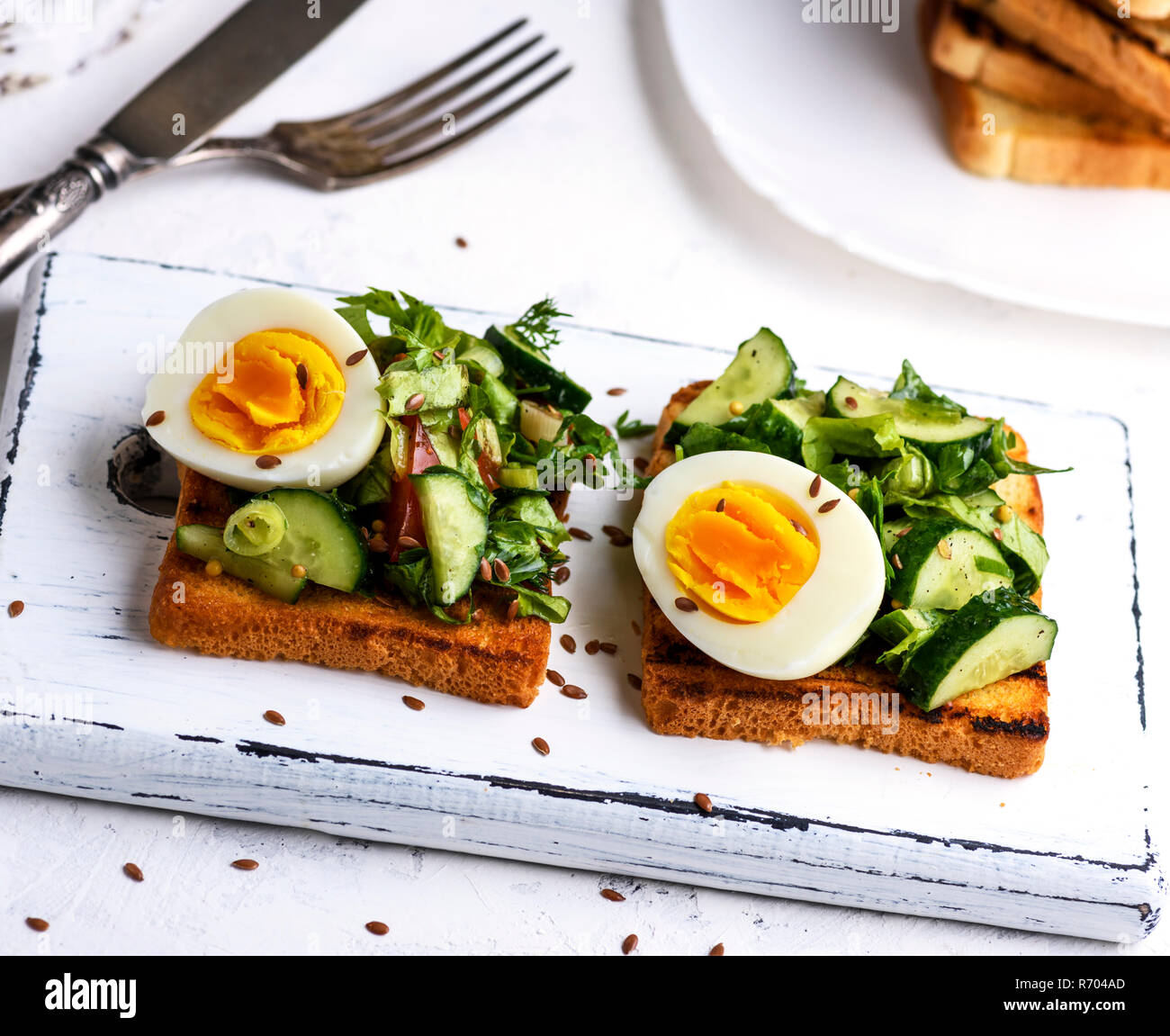 pieces of bread from white wheat flour with boiled egg Stock Photo - Alamy