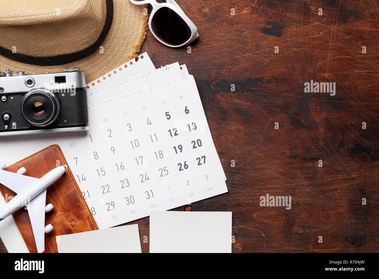 Travel vacation background concept with sun hat, camera, passport ...