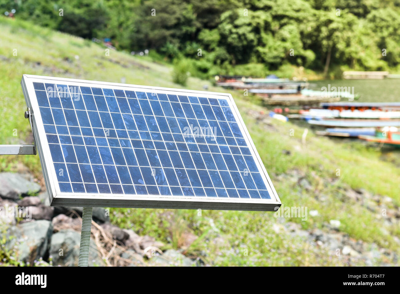 Solar panel with river view in the background Stock Photo - Alamy