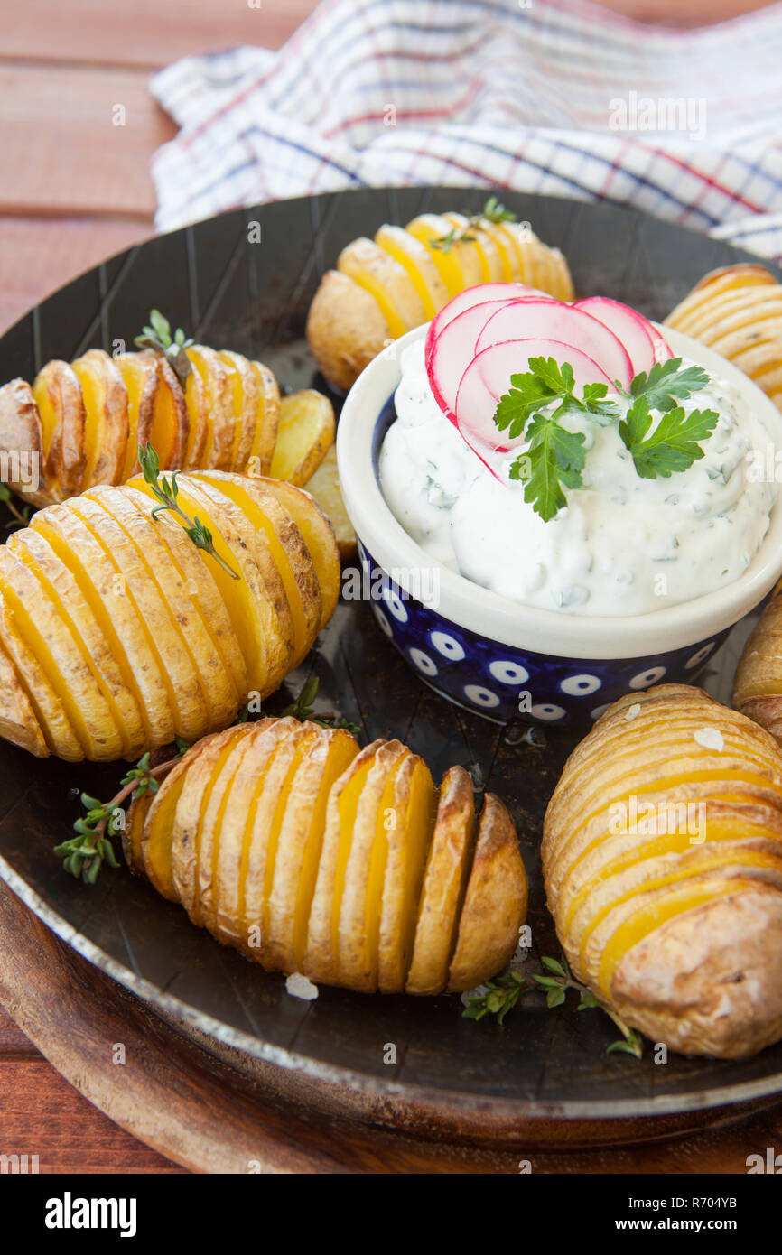 rustic fan potatoes Stock Photo - Alamy
