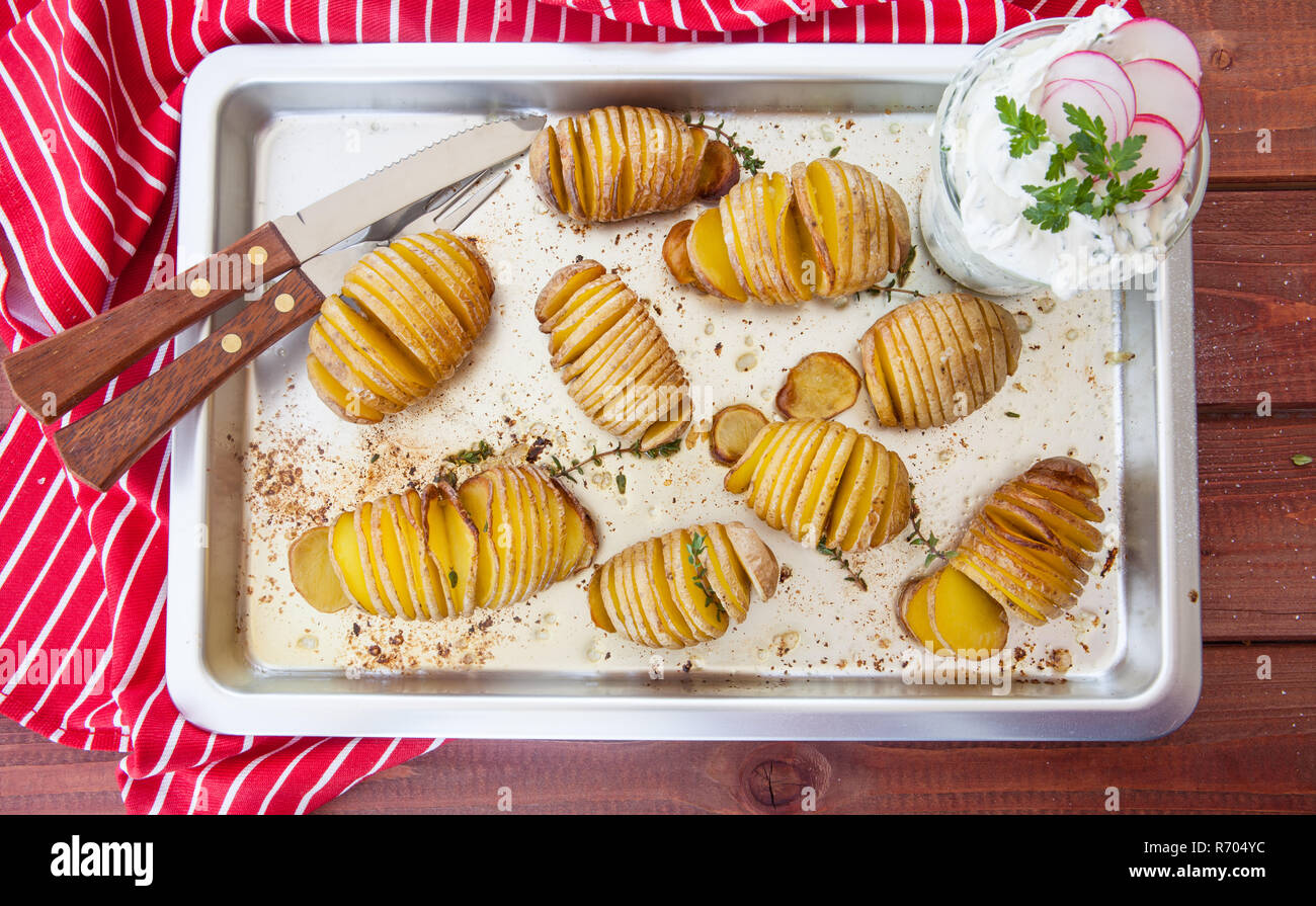 rustic fan potatoes Stock Photo - Alamy