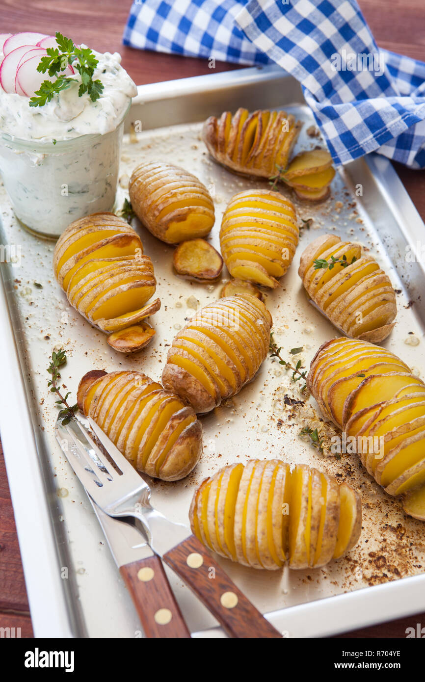 rustic fan potatoes Stock Photo - Alamy