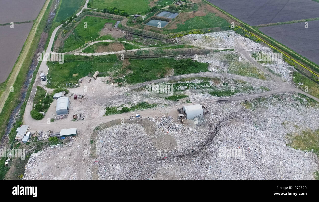 garbage dump with heaps of garbage and treatment facilities. Landfill ...