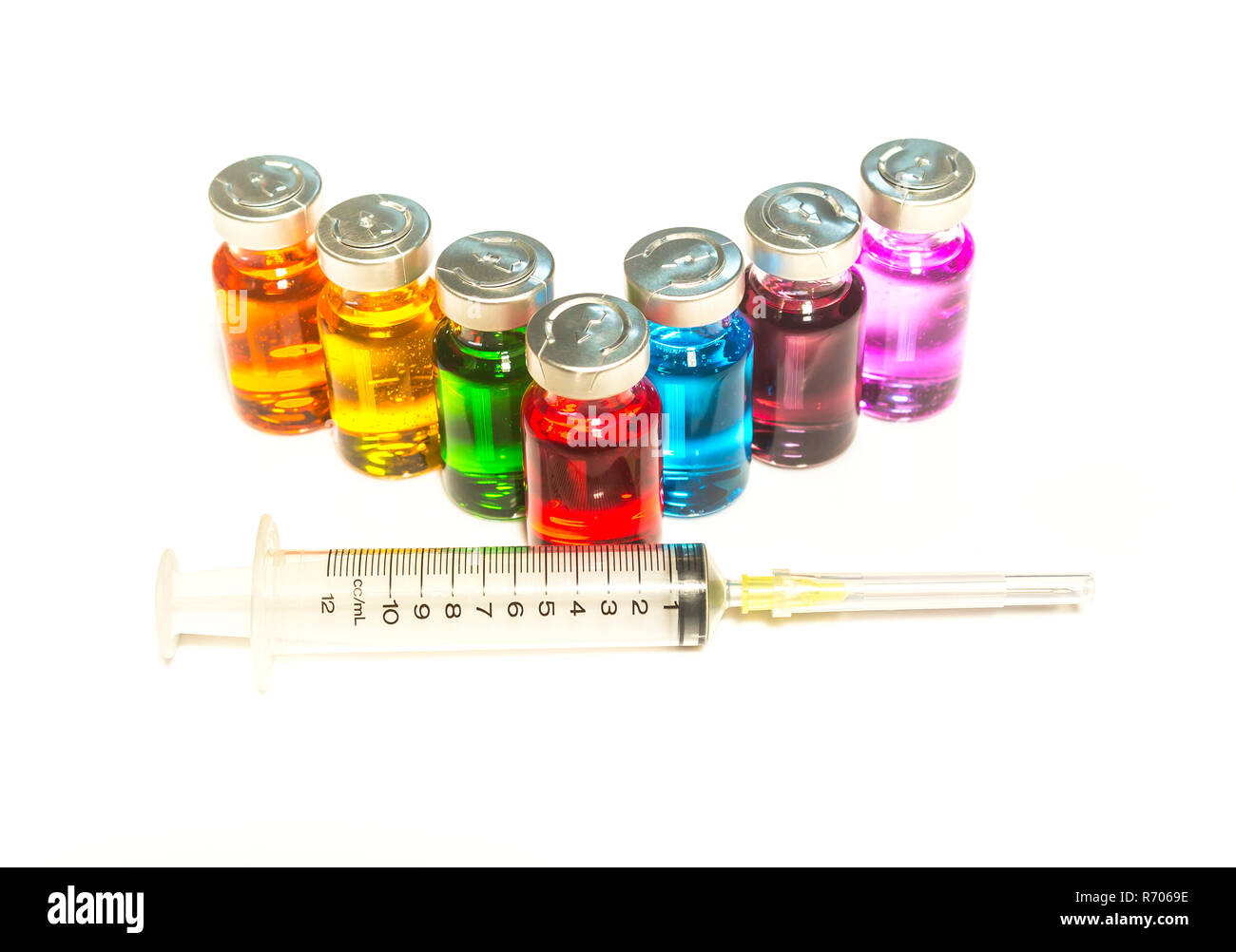 Injection needle syringe and vials with medicine Stock Photo - Alamy