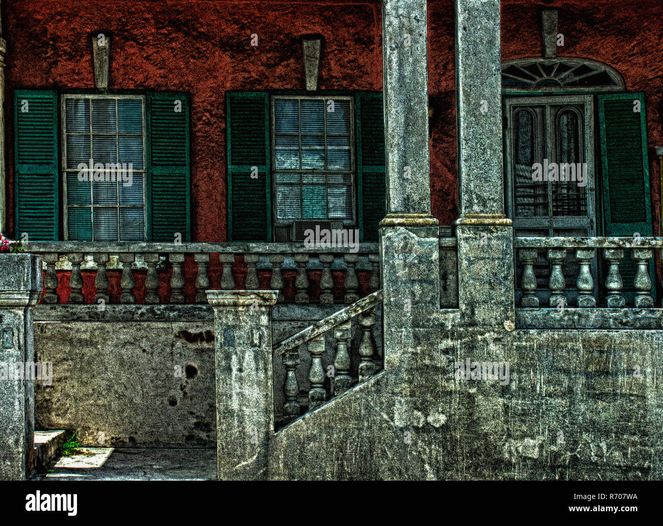 House with railing. Old rustic window with shutters Stock Photo - Alamy