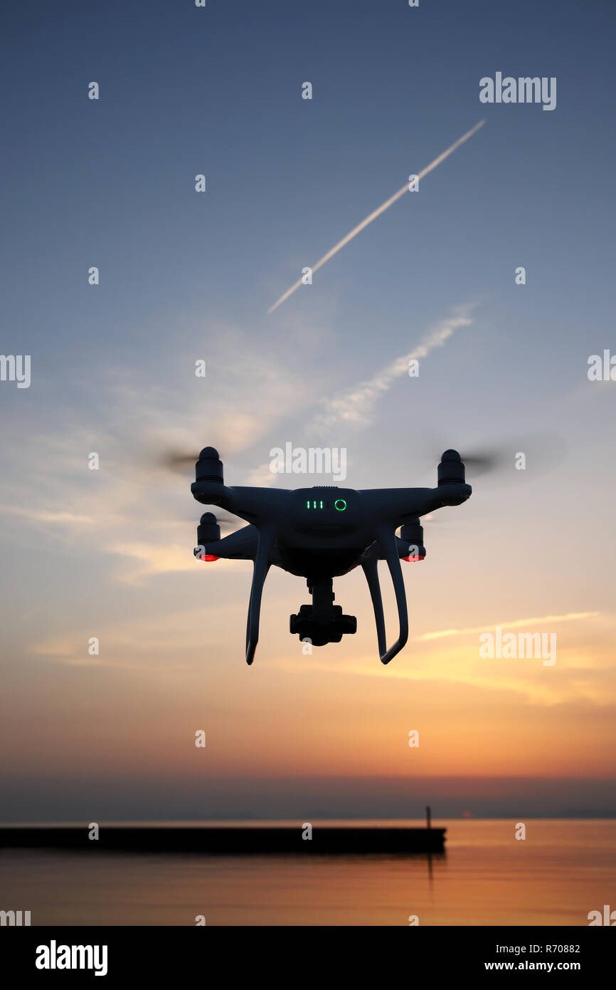 Remote controlled drone equipped with aerial photo and video hovering ...