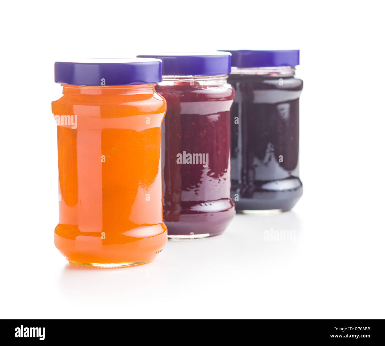 Tasty fruity jam in jar Stock Photo - Alamy