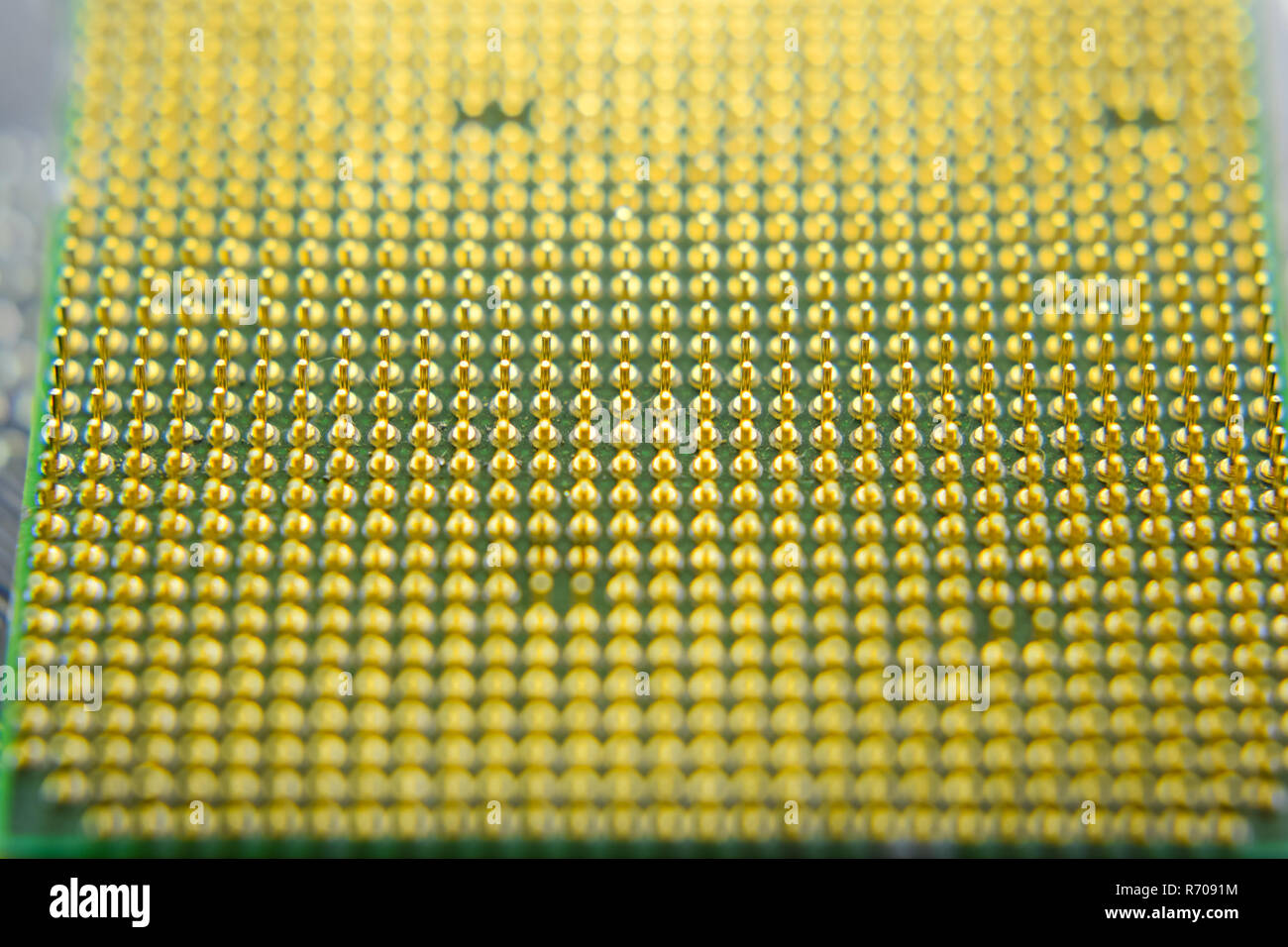 Computer processor, contact feet. Electronic board with electrical ...