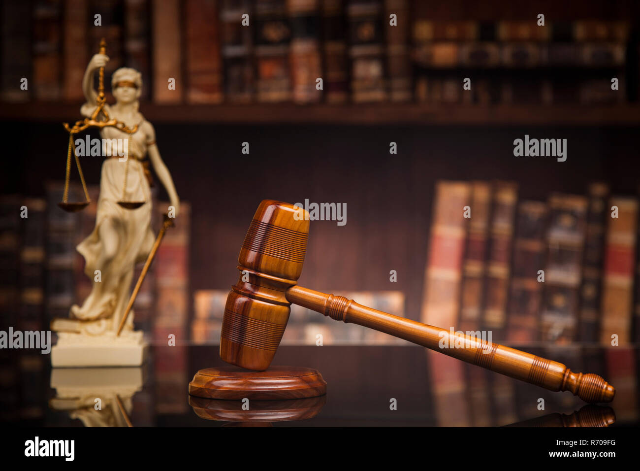 Antique statue of justice, law, books background Stock Photo - Alamy