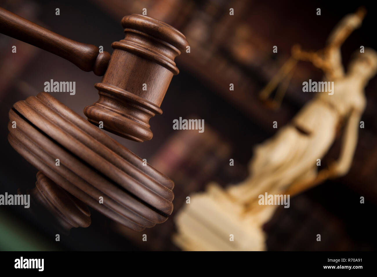 Antique statue of justice, law, books background Stock Photo - Alamy