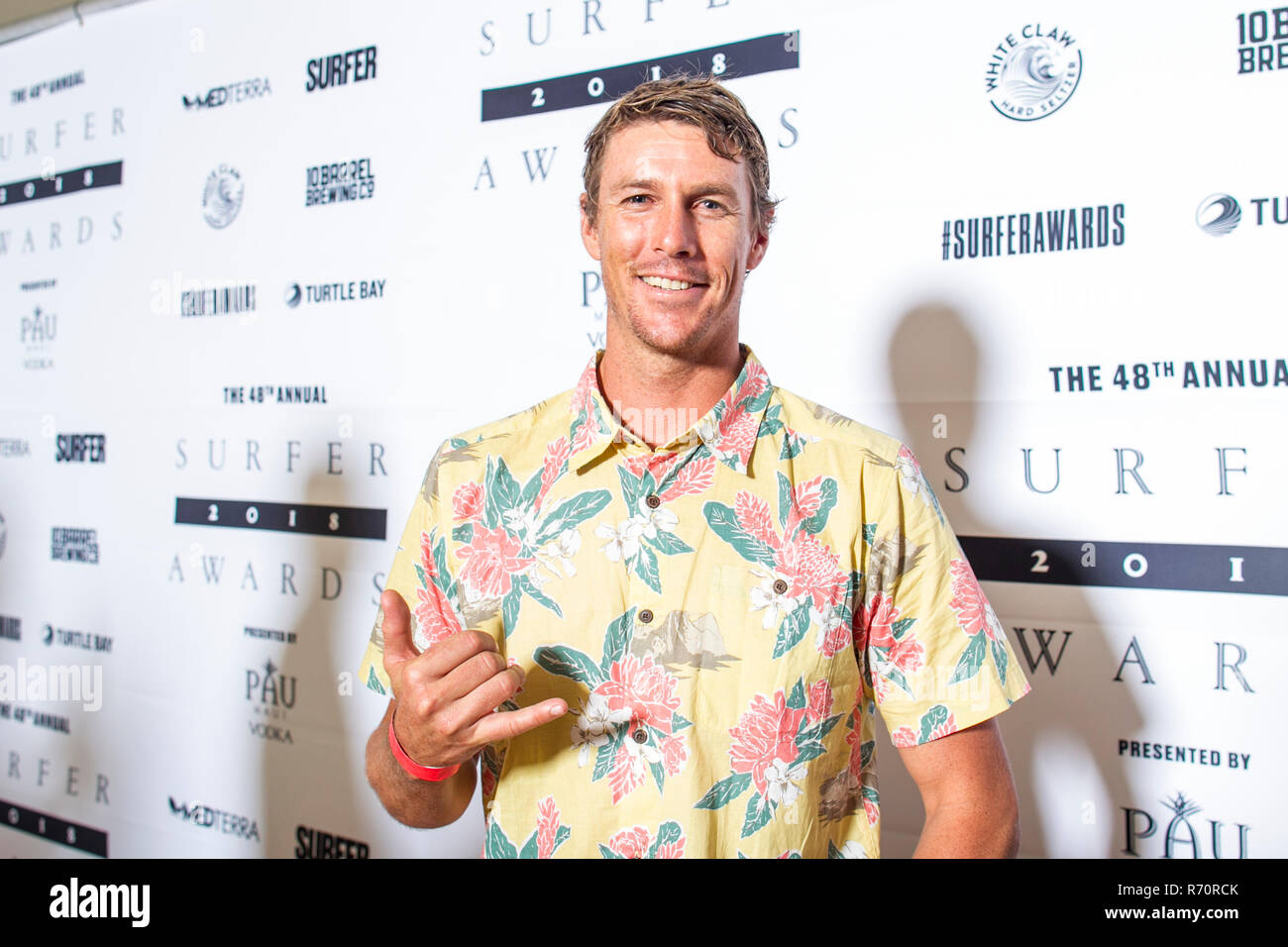 Kahuku, Hawaii, USA. 6th December 2018.Big Wave surfer Ian Walsh poses ...