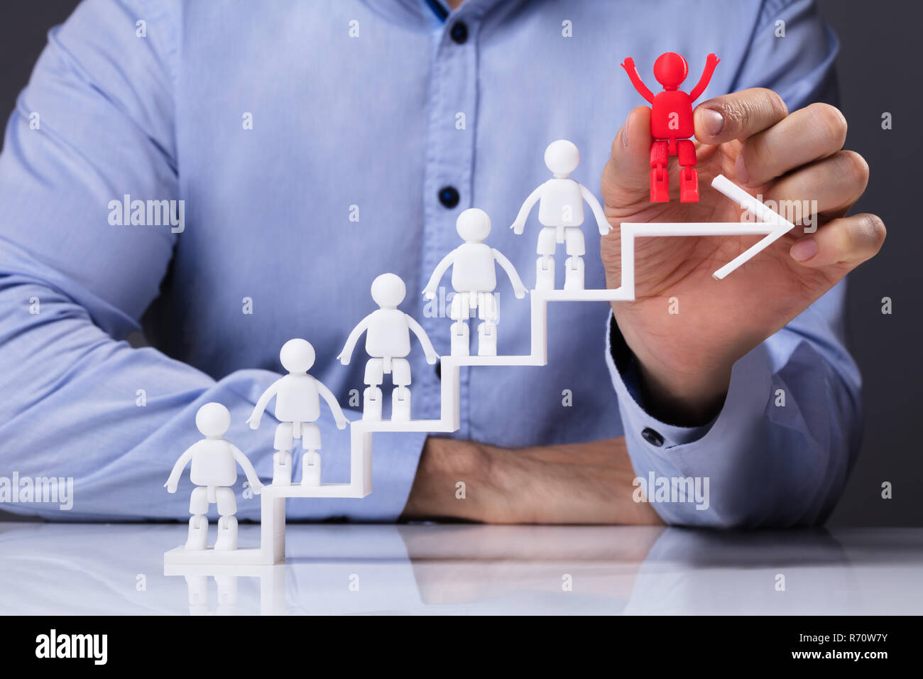 Placing figures hi-res stock photography and images - Alamy