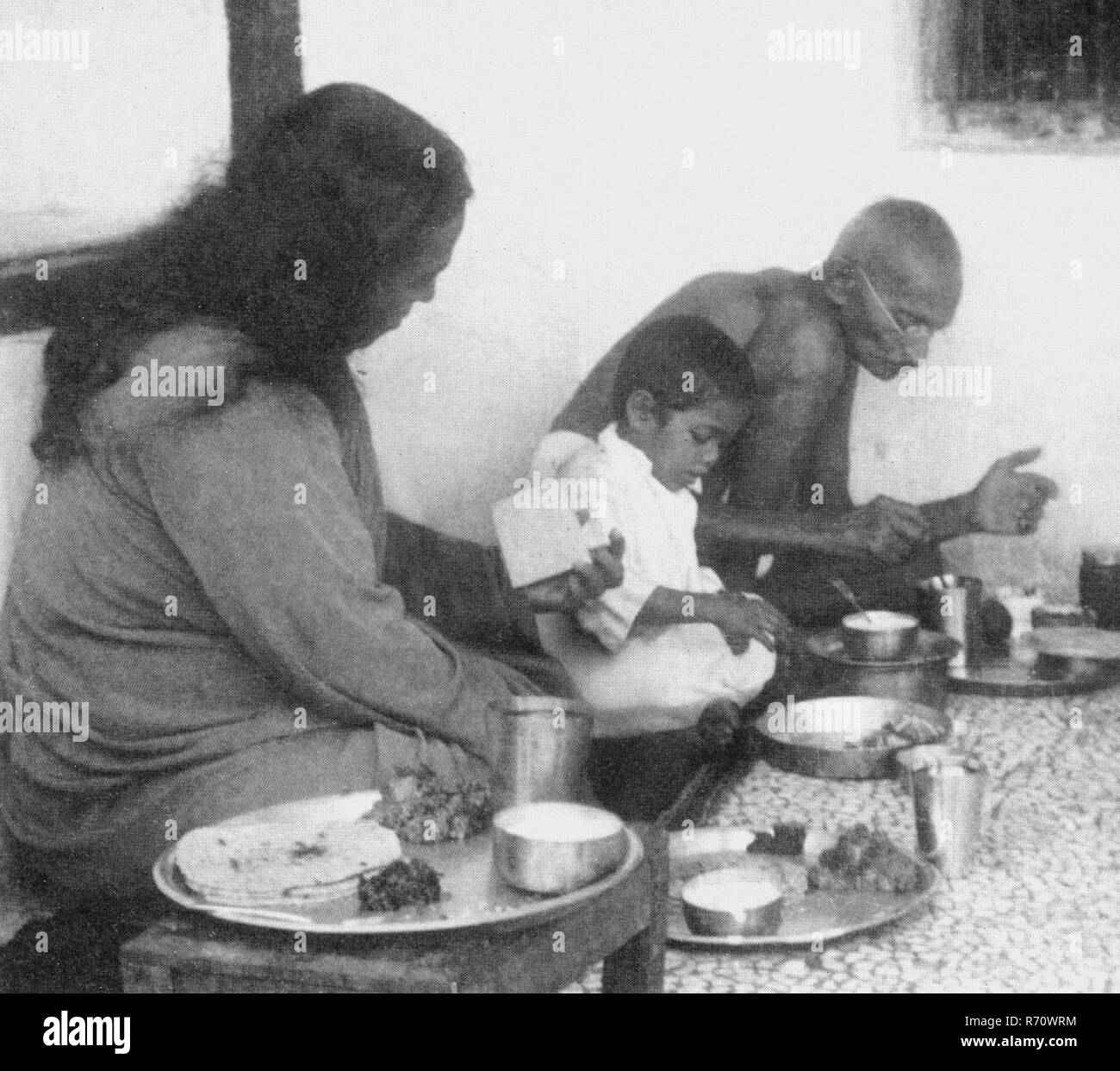 Boy eating lunch vintage hi-res stock photography and images - Alamy