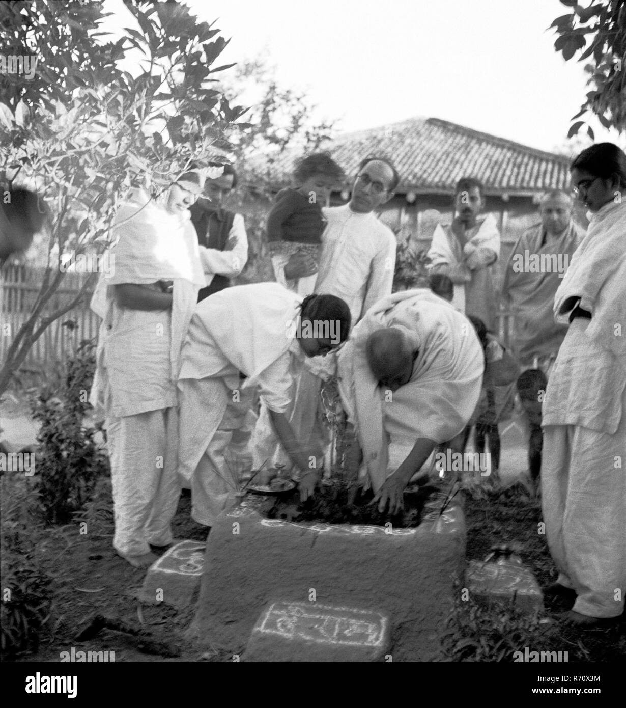 Mahatma Gandhi and his niece Abha Gandhi planting tulsi tree at ...