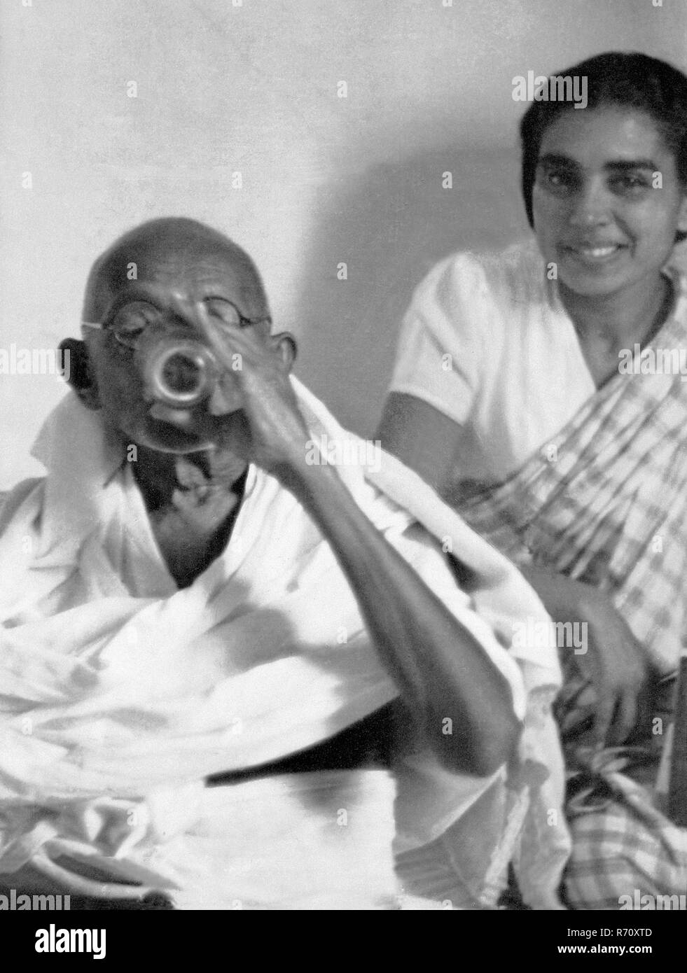 Mahatma Gandhi breaking his last fast in Birla House, New Delhi, India ...