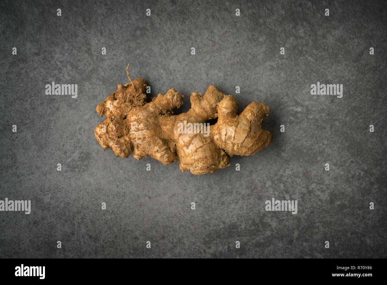 Top view fresh raw ginger root with copy space on dark background Stock ...