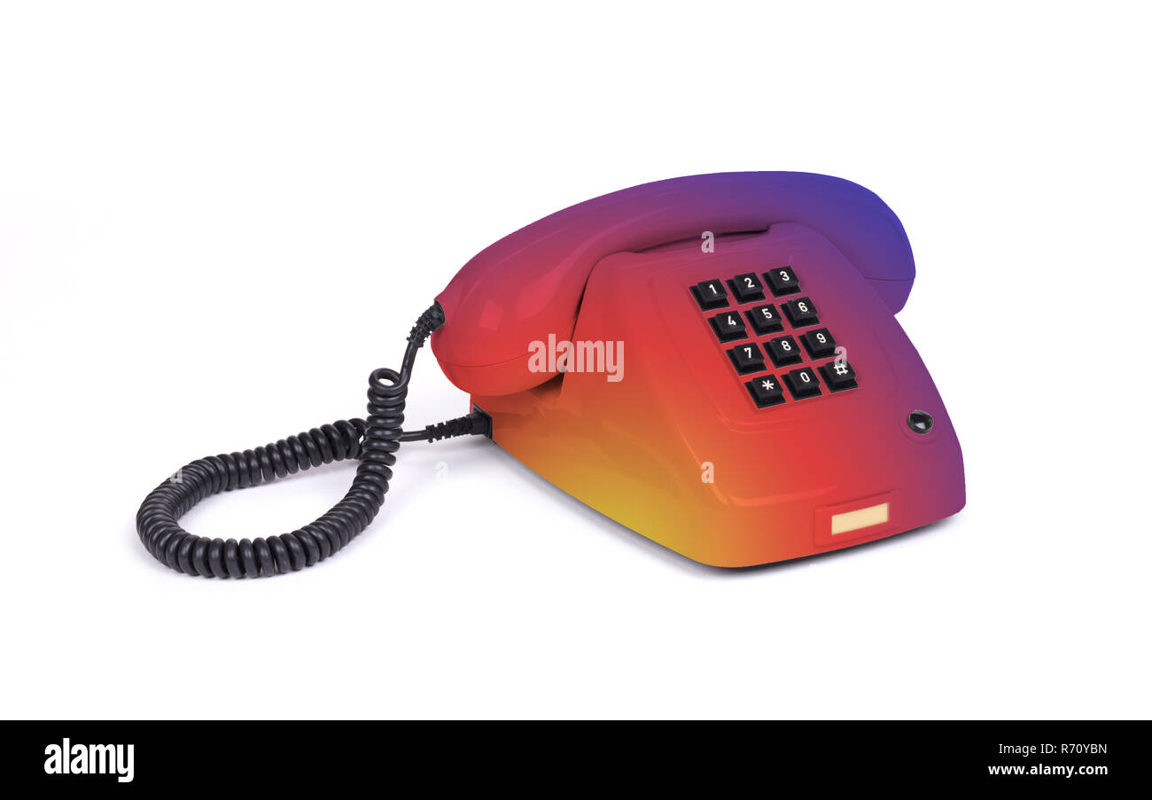 Vintage multi colored telephone with a white background Stock Photo - Alamy