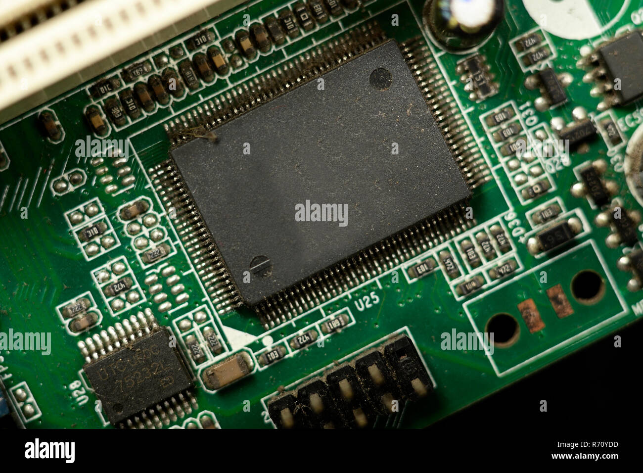 Close-up of electronic chip in desktop computer motherboard circuit ...
