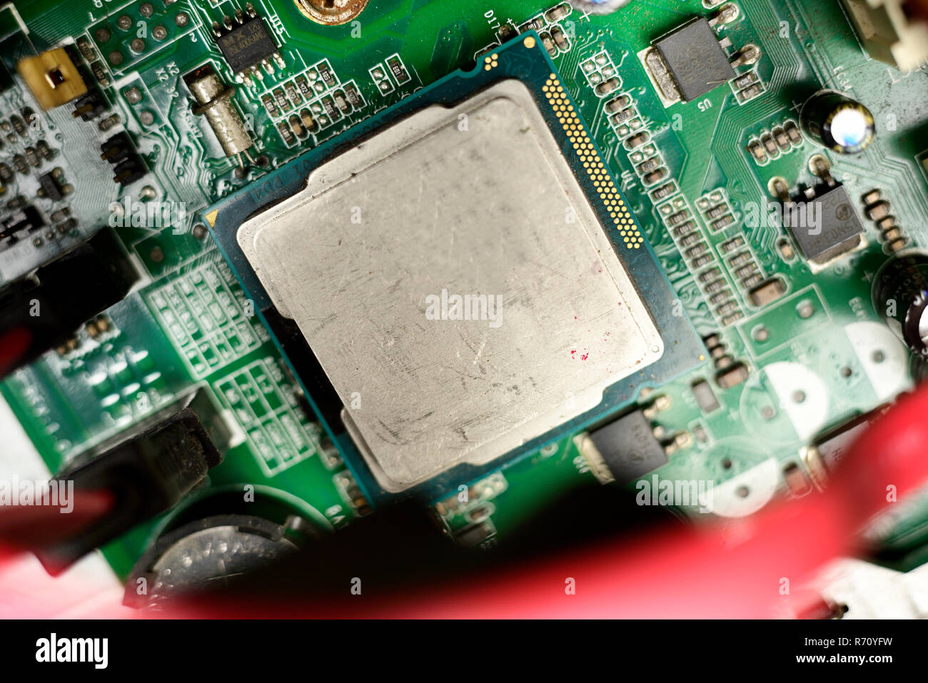 Close-up of electronic chip in desktop computer motherboard circuit ...