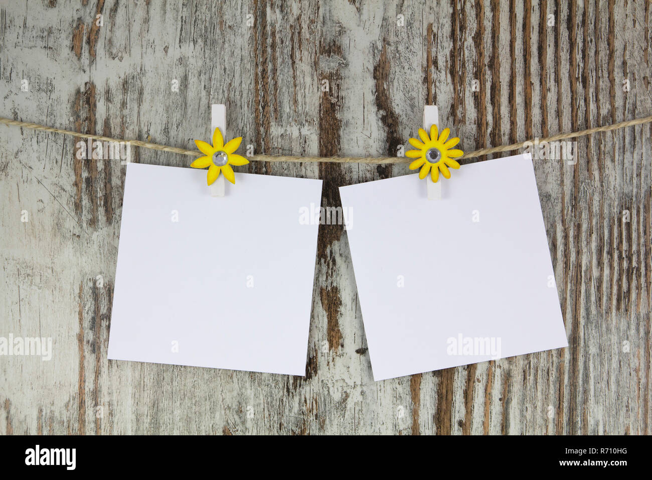 Empty notes hanging with a clothespin, in a wood background Stock Photo ...