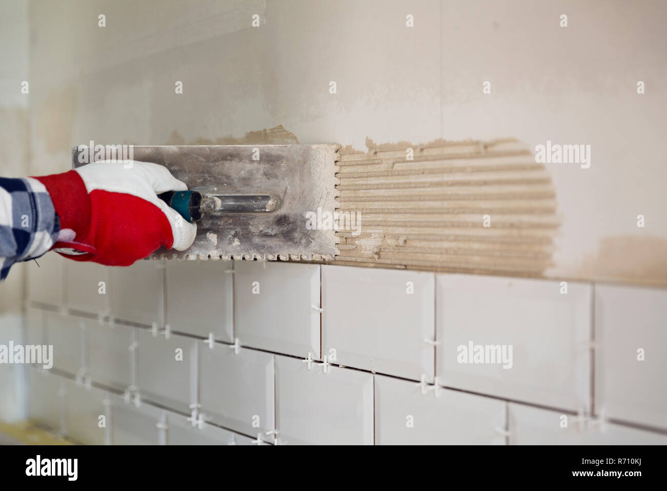 Worker bathroom tiles man tiling tool hi-res stock photography and ...