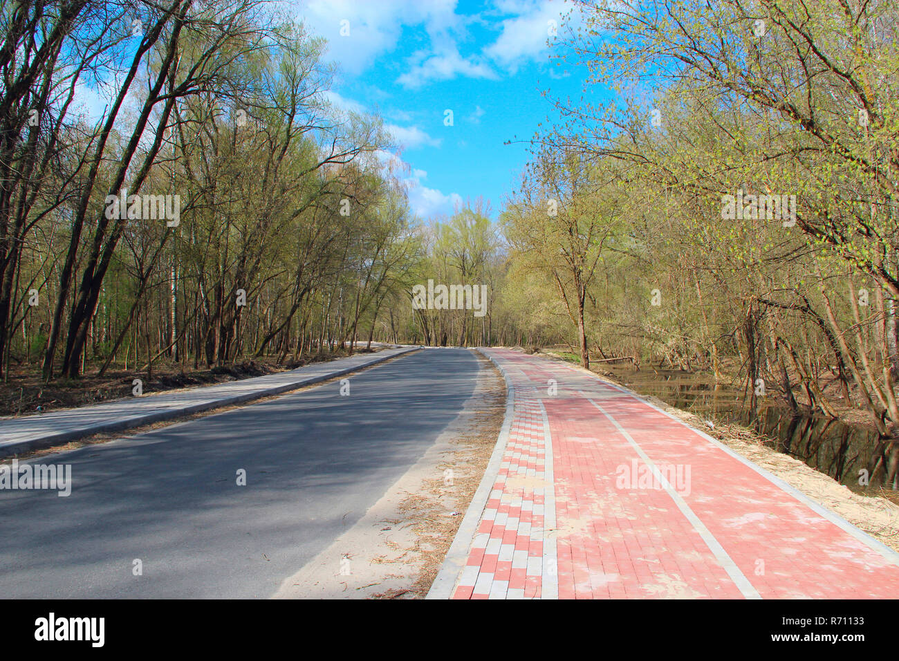 Long asphalted road hi-res stock photography and images - Alamy