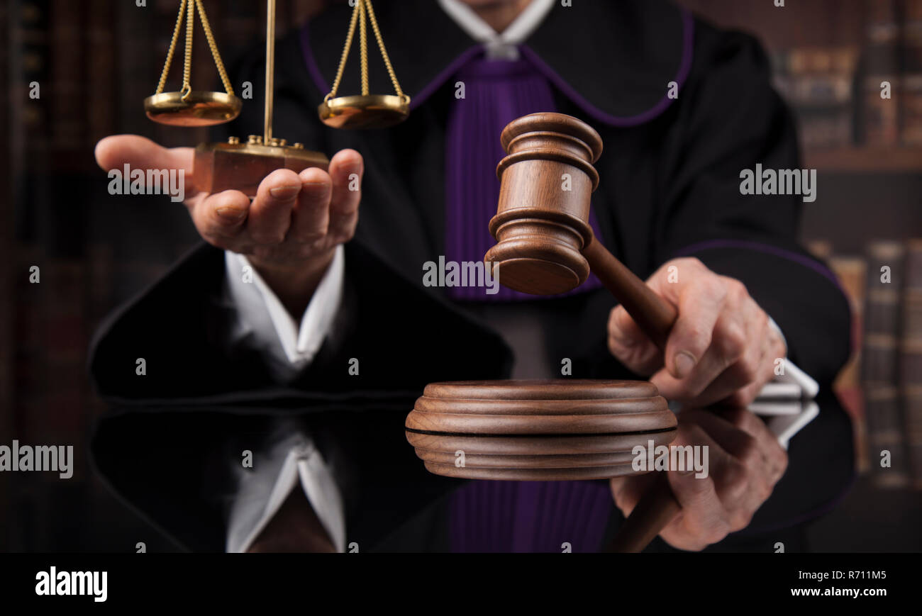 Judge, male judge in a courtroom striking the gavel Stock Photo - Alamy