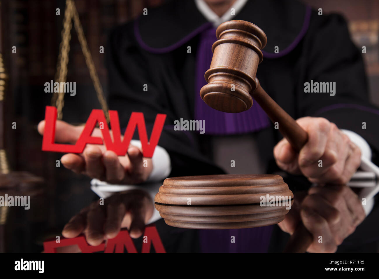 Judge, male judge in a courtroom striking the gavel Stock Photo - Alamy