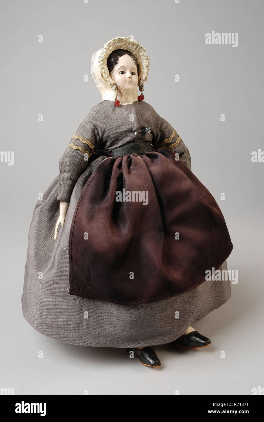 mw. Andres-Van Embden, Dollhouse doll, papier-mâché head with inlaid ...