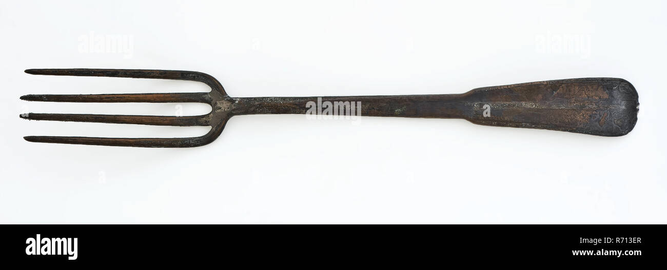 Copper fork with four long teeth and flat handle with spatula-shaped ...