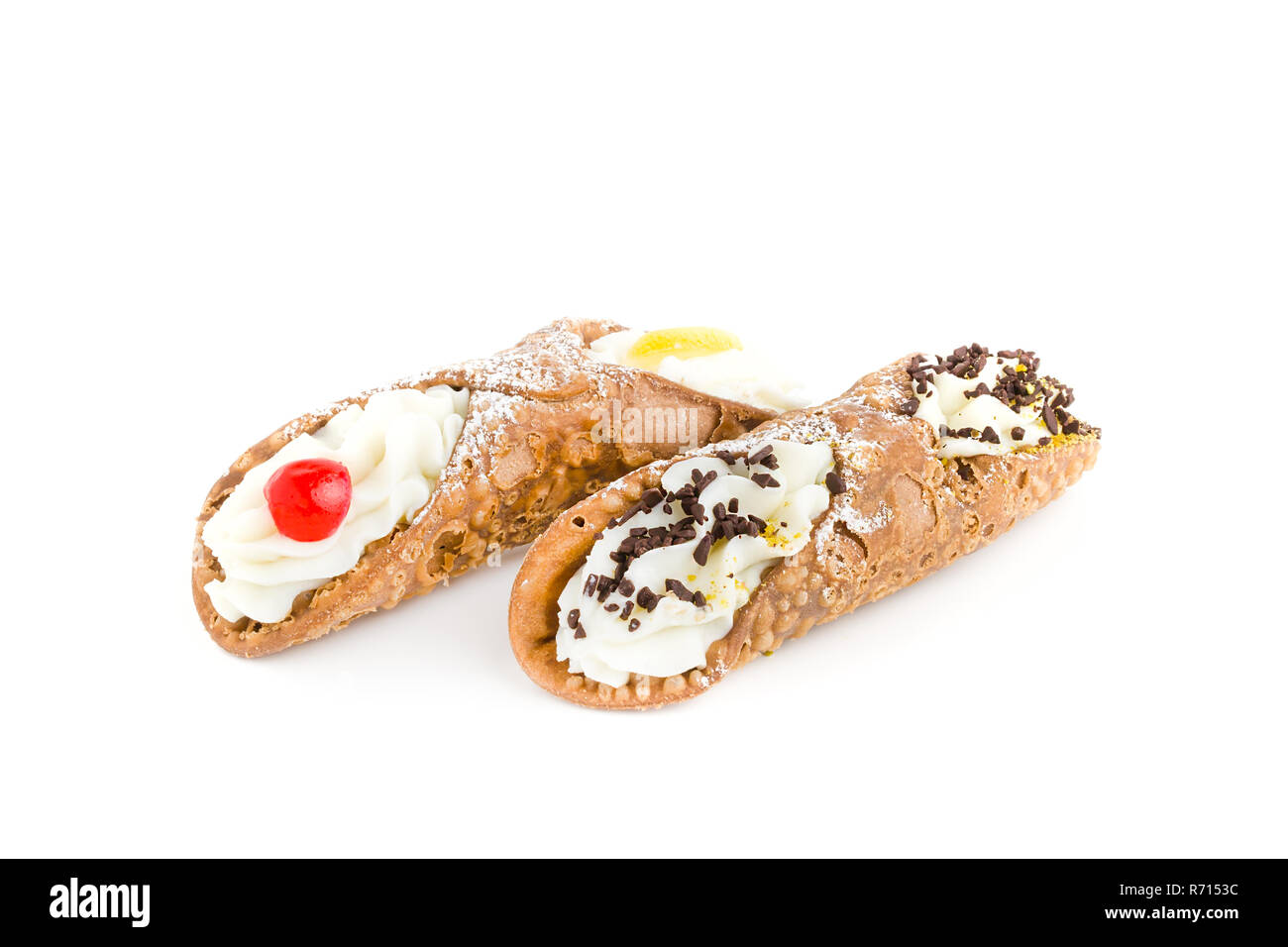 Two cannoli pastries. Traditional Sicilian dessert, filled with a rich ...