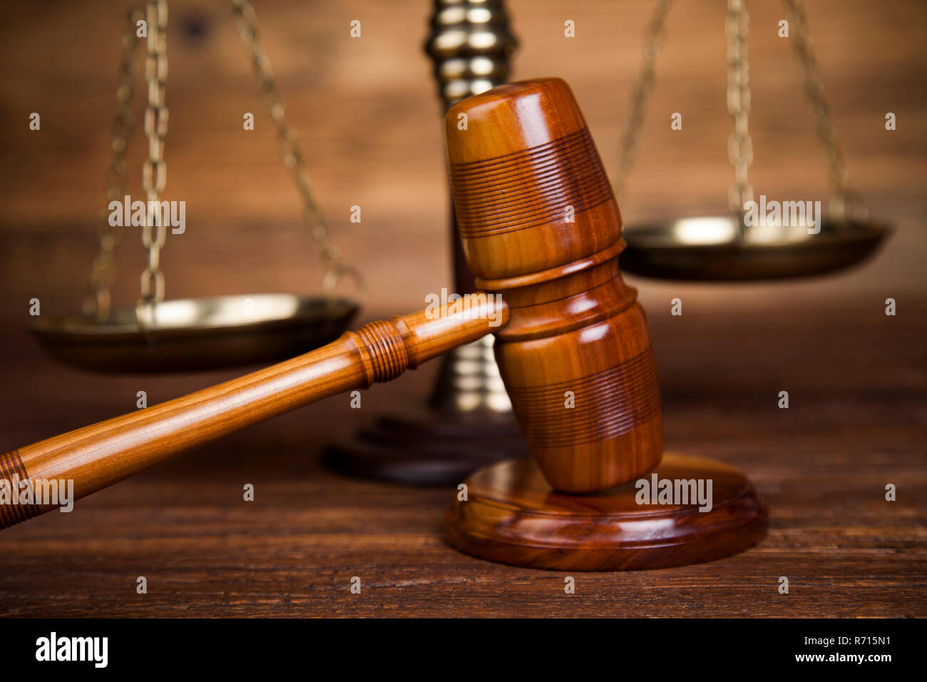 Law theme, mallet of the judge, wooden desk background Stock Photo - Alamy