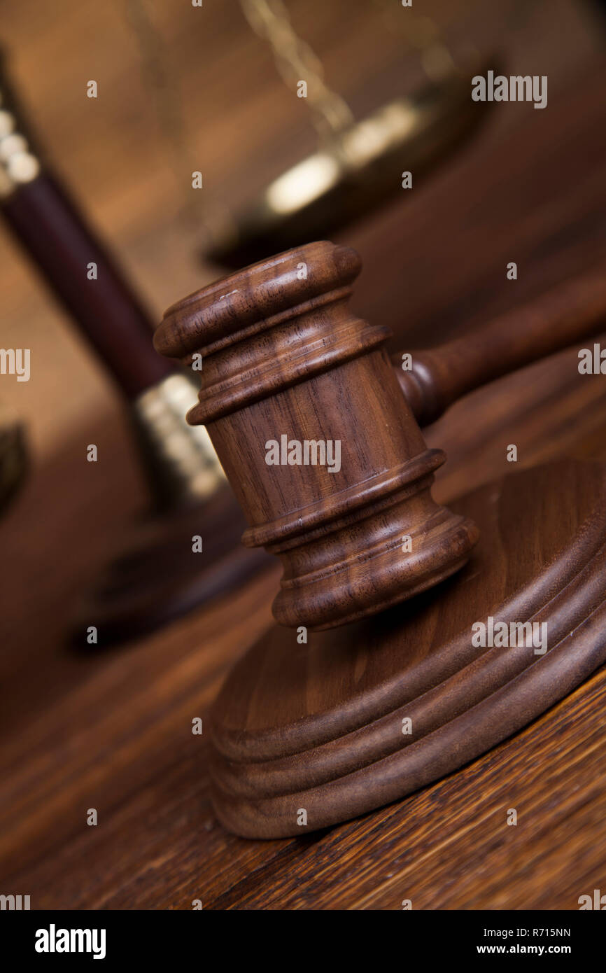 Law theme, mallet of the judge, wooden desk background Stock Photo - Alamy