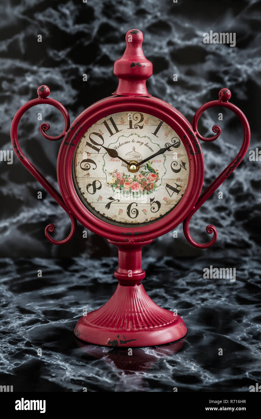 Decorative Red Vintage Clock With Cast Iron Pedestal Stock Photo - Alamy
