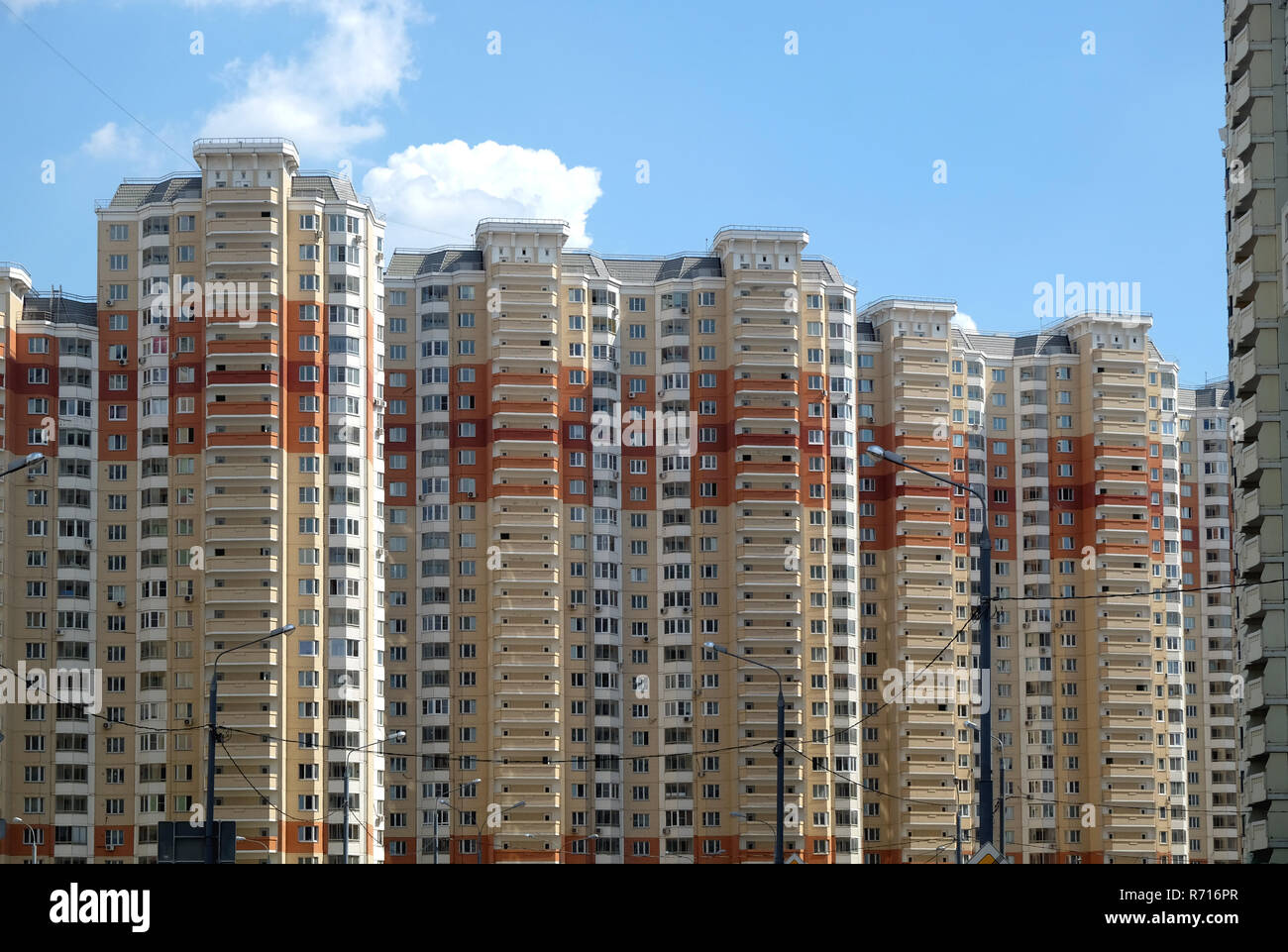 Top section of modern apartment building constructed from bricks in ...