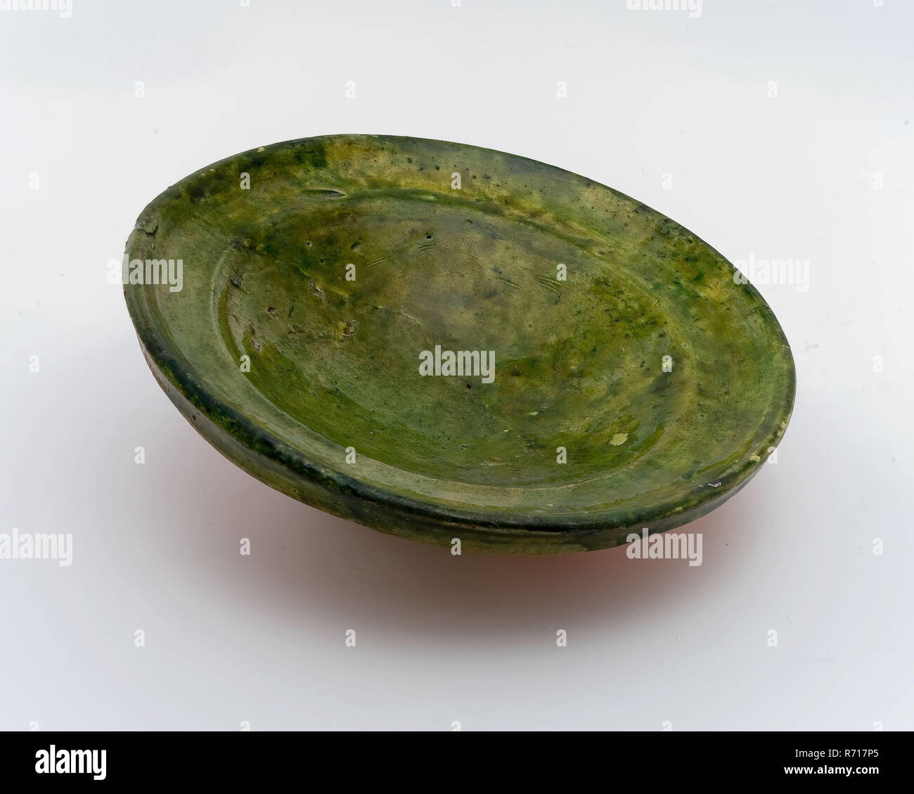 Earthenware dish, white shard, green glazed, on stand, salt scale? salt ...