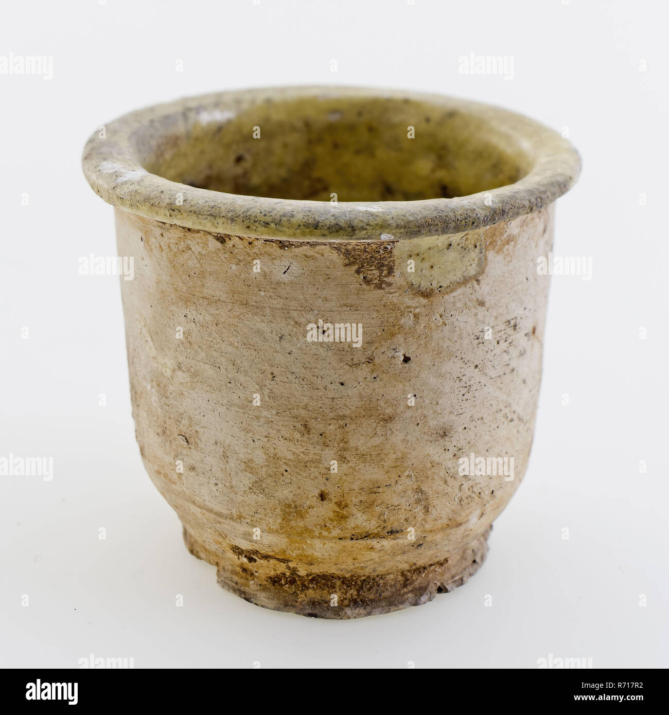 Pottery ointment jar, white shard, internally glazed yellow, ointment ...